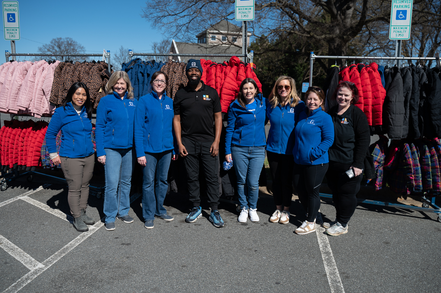 One Warm Coat Team Members Share Warmth - One Warm Coat