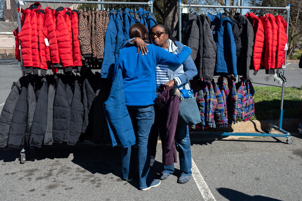 One Warm Coat Team Members Share Warmth - One Warm Coat